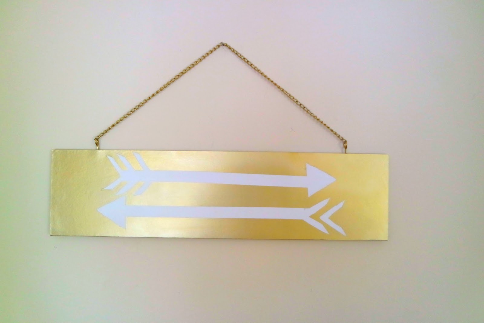 Angie Kariofilli: DIY Arrow Sign Art