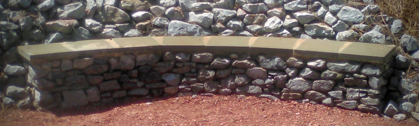 Greetings from Earth: Bang for your Buck...Rip Rap Stone Bench