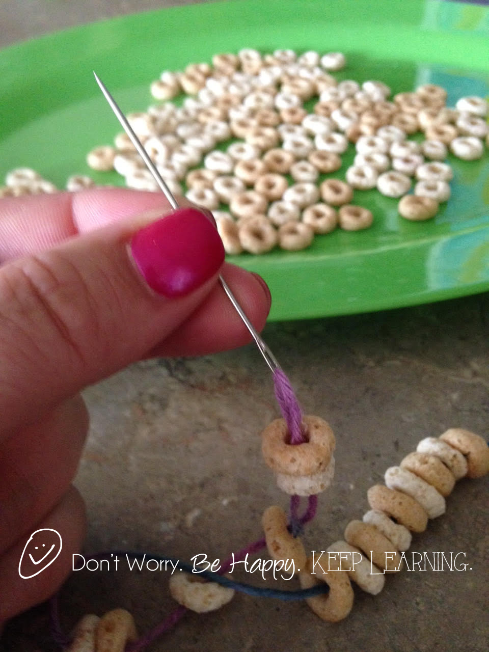 Don't worry. Be happy. Keep learning.: Cheerios necklace.