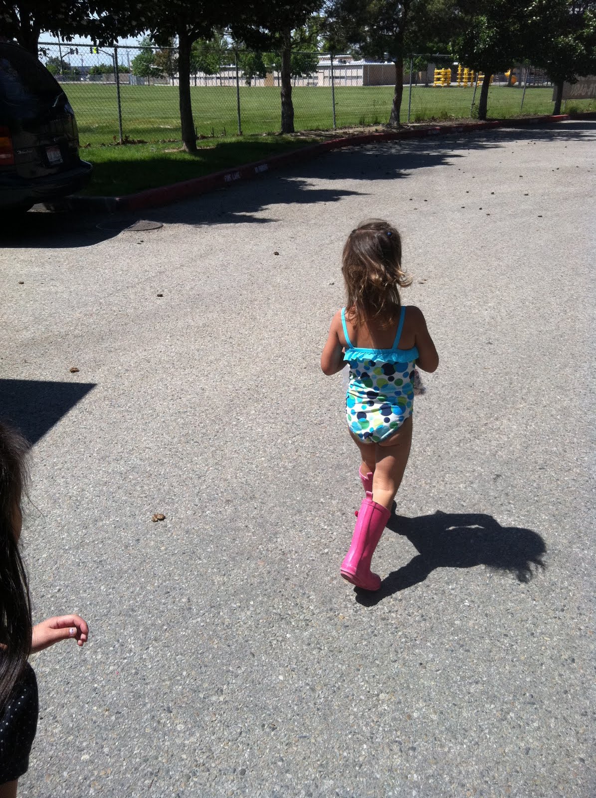 she believed she could....: pink boots and a bathing suit