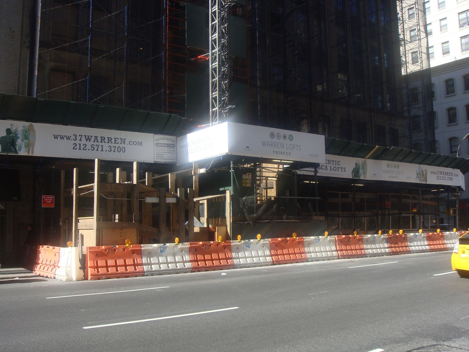 Color X: Construction barricade large format graphics