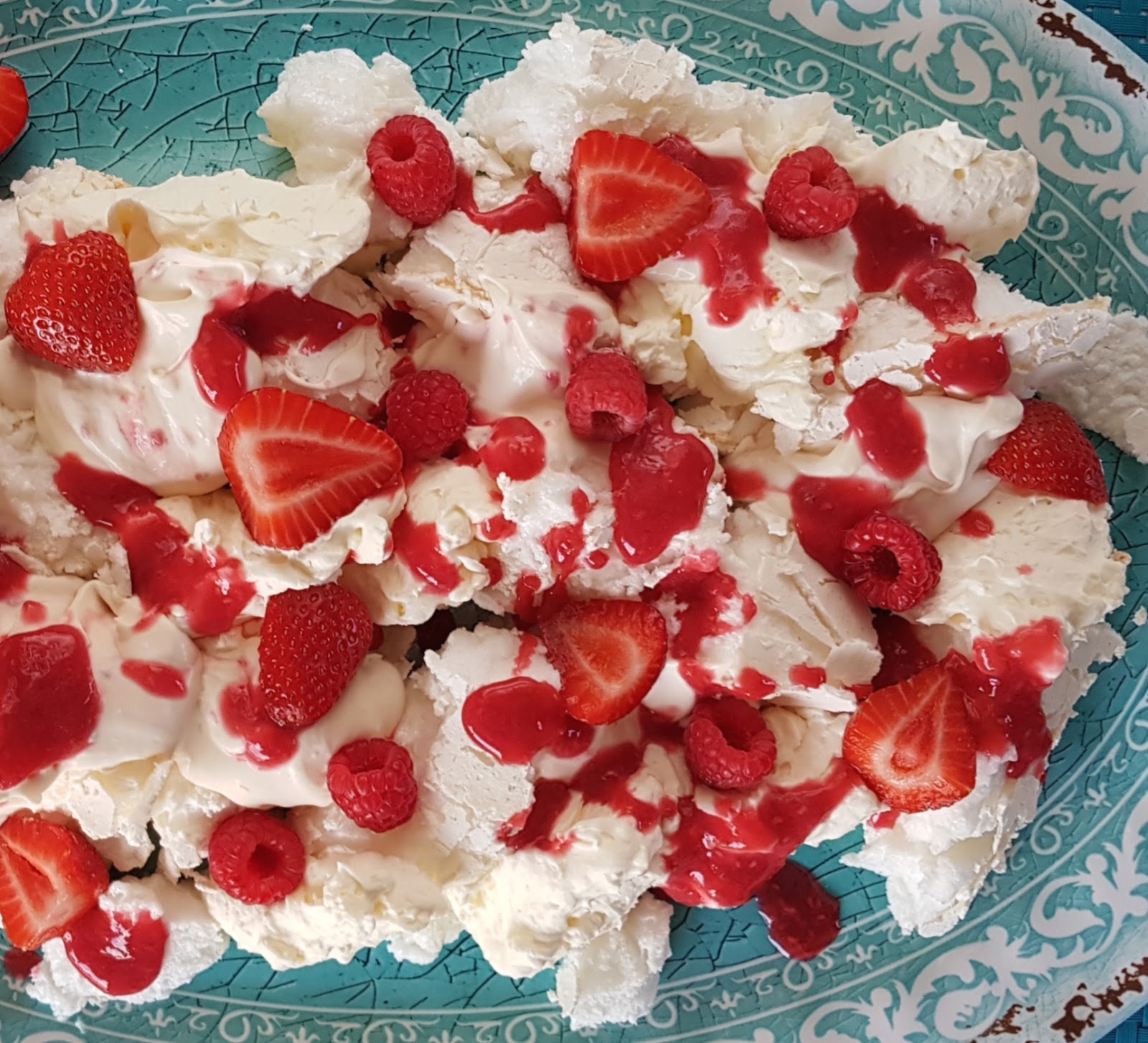 Smashed Pavlova with Raspberry Coulis Cream