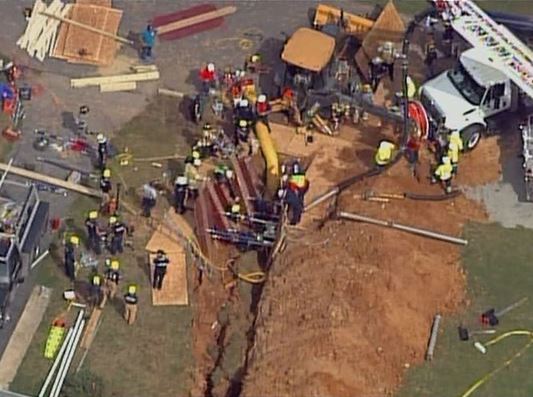 MEC&F Expert Engineers : Utility-trench digging worker with Broy and ...