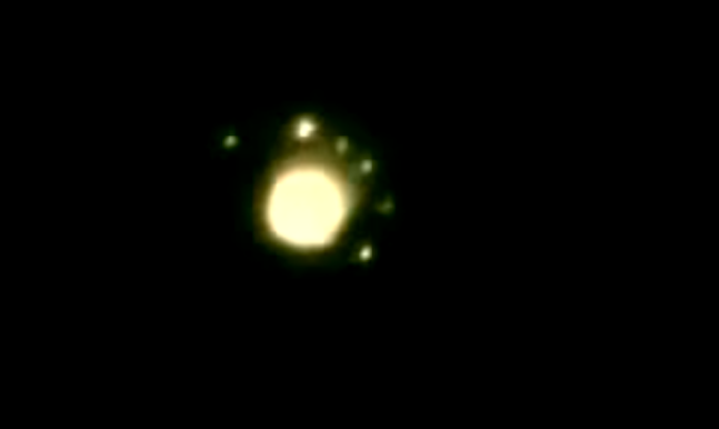 UFO SIGHTINGS DAILY: Close up of UFO with many glowing orbs orbiting ...