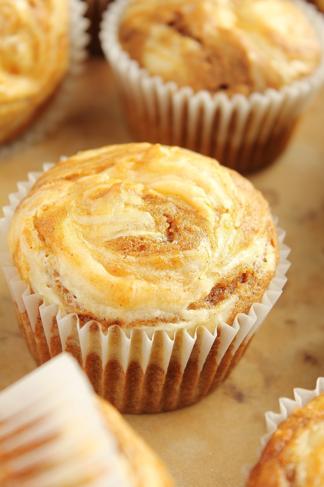 Pumpkin Cheesecake Swirl Muffins