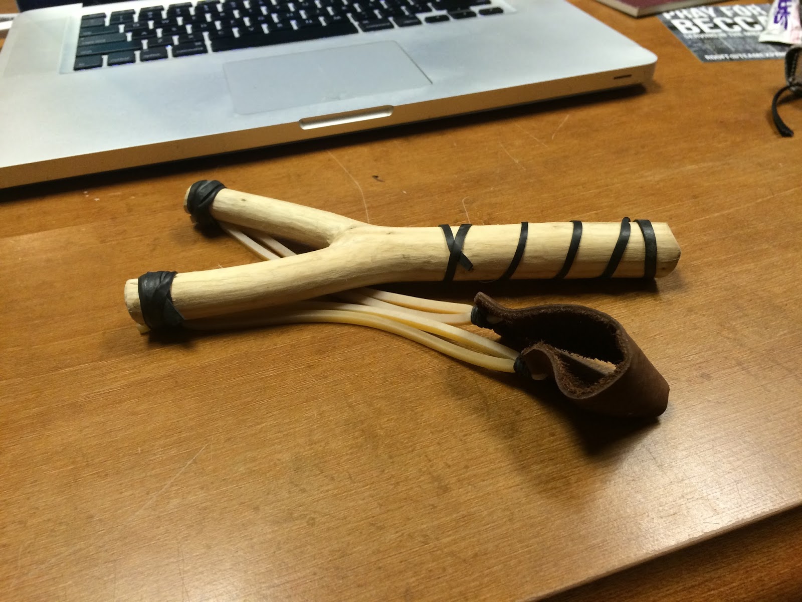 At the Water's Edge . . . : Slingshots and Smooth Stones