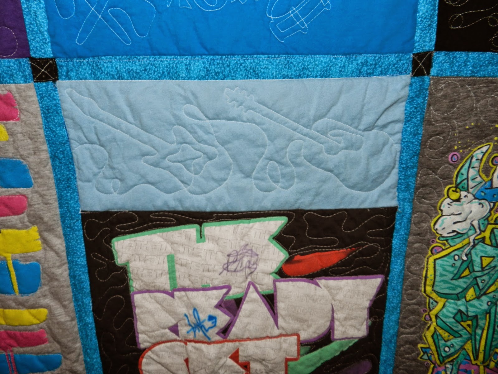 Dinah's Quilts & Embroidery: Band T-Shirt Quilt