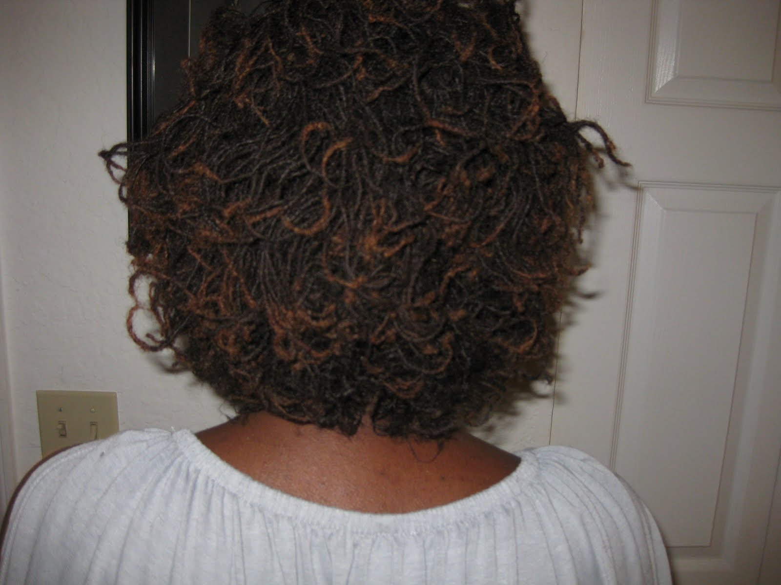 Kreyola's Journeys: Bantu Knots Result on Micro Sisterlocks