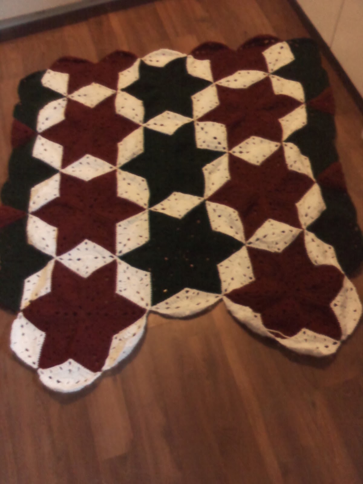 Crocheting and life in general: Christmas Star Throw and new purchase