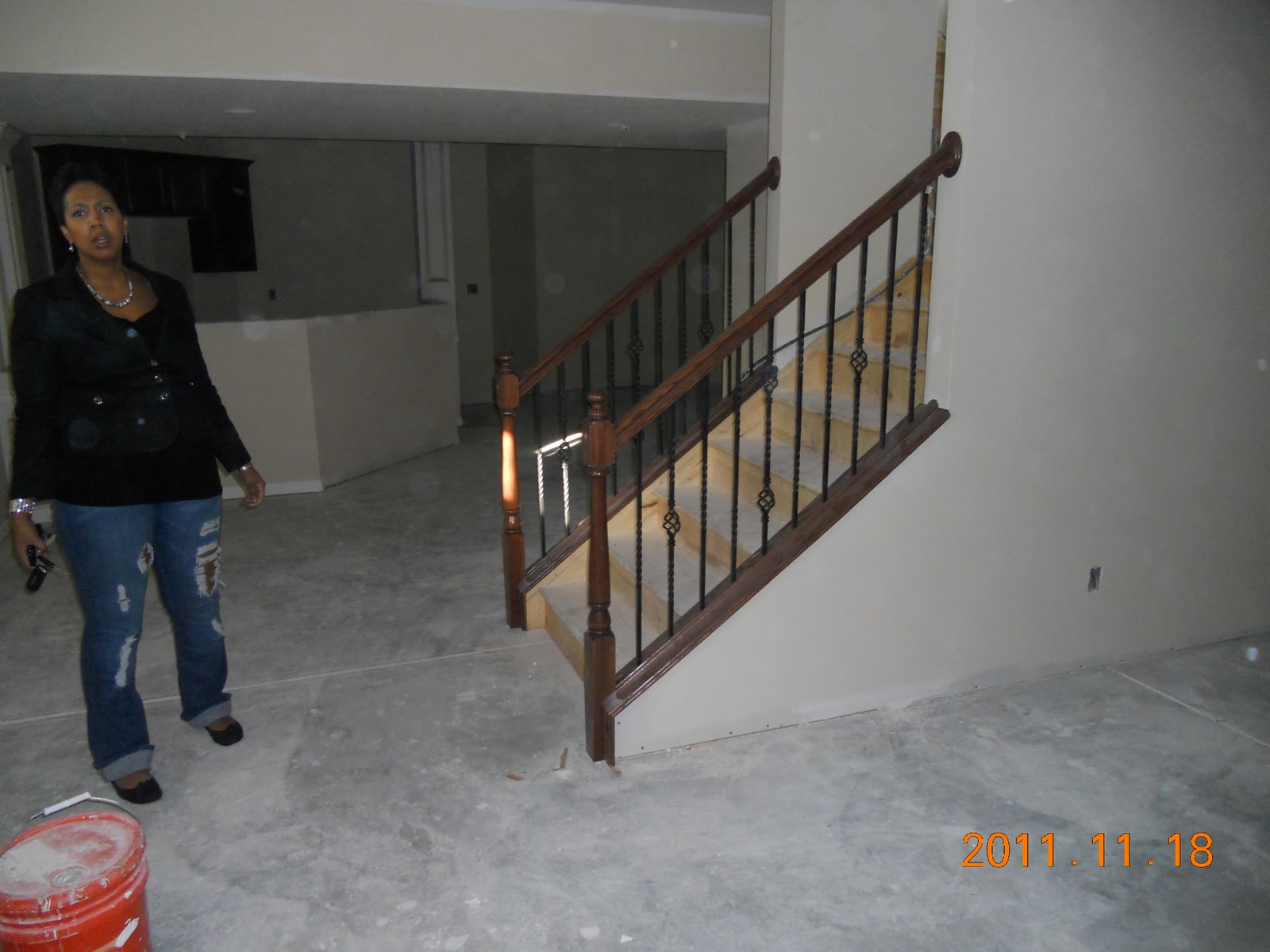 Brick work complete, stair railing installed and trim work in progress ...