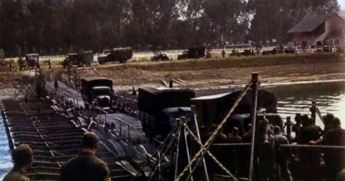World War II in Color: A Motor Column Crossing a River on a Pontoon Bridge