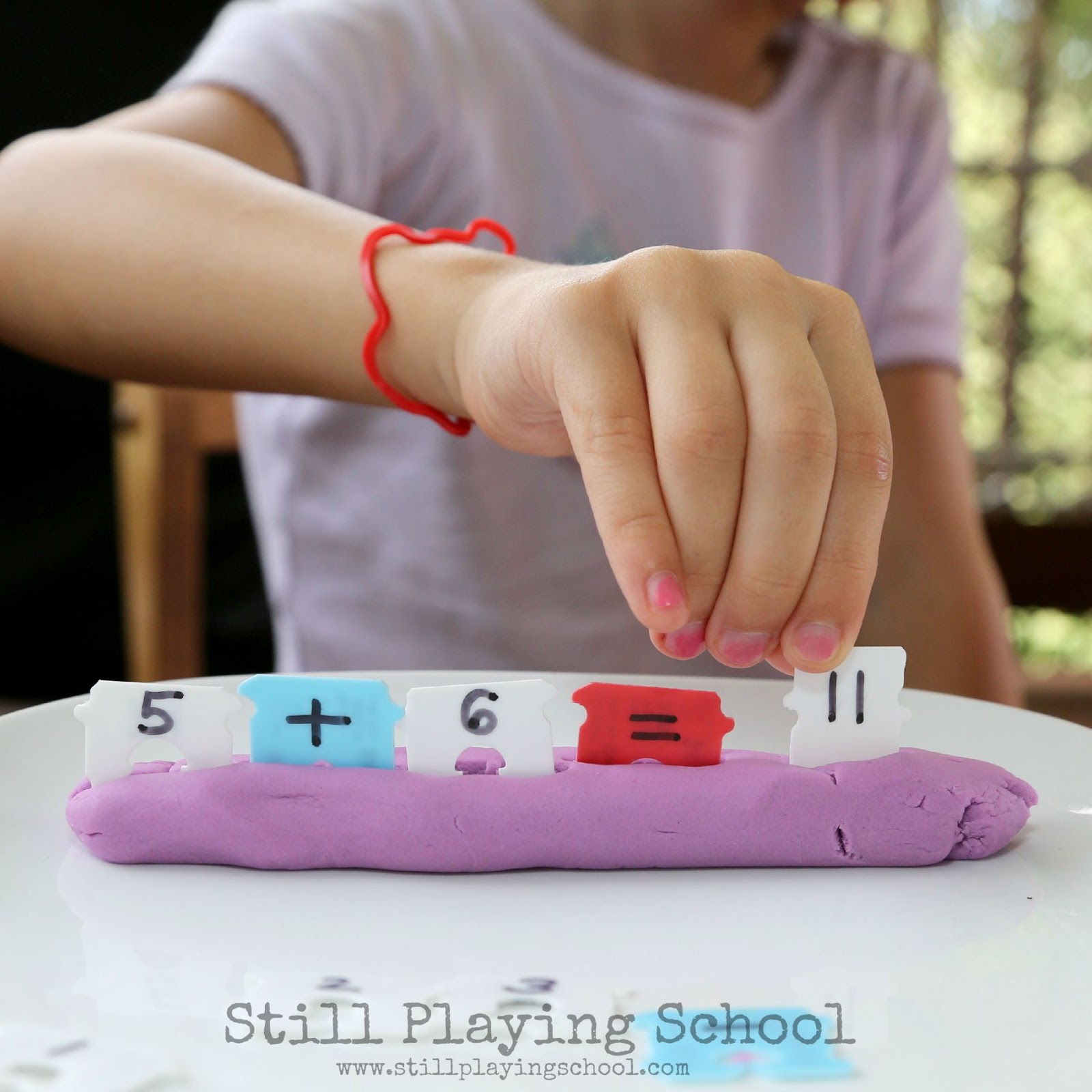 Fine Motor Math Game with Bread Ties | Still Playing School