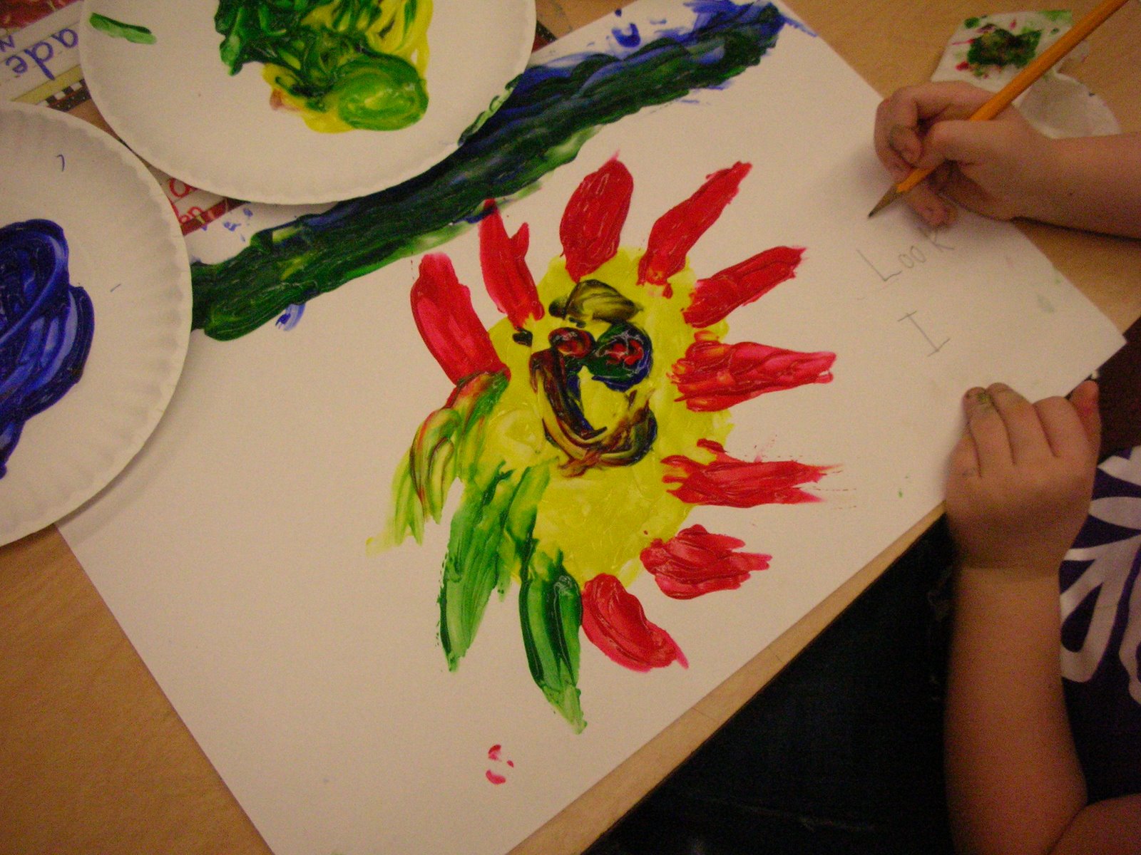 Finger Painting and Creative Writing – Love, Laughter, and Literacy