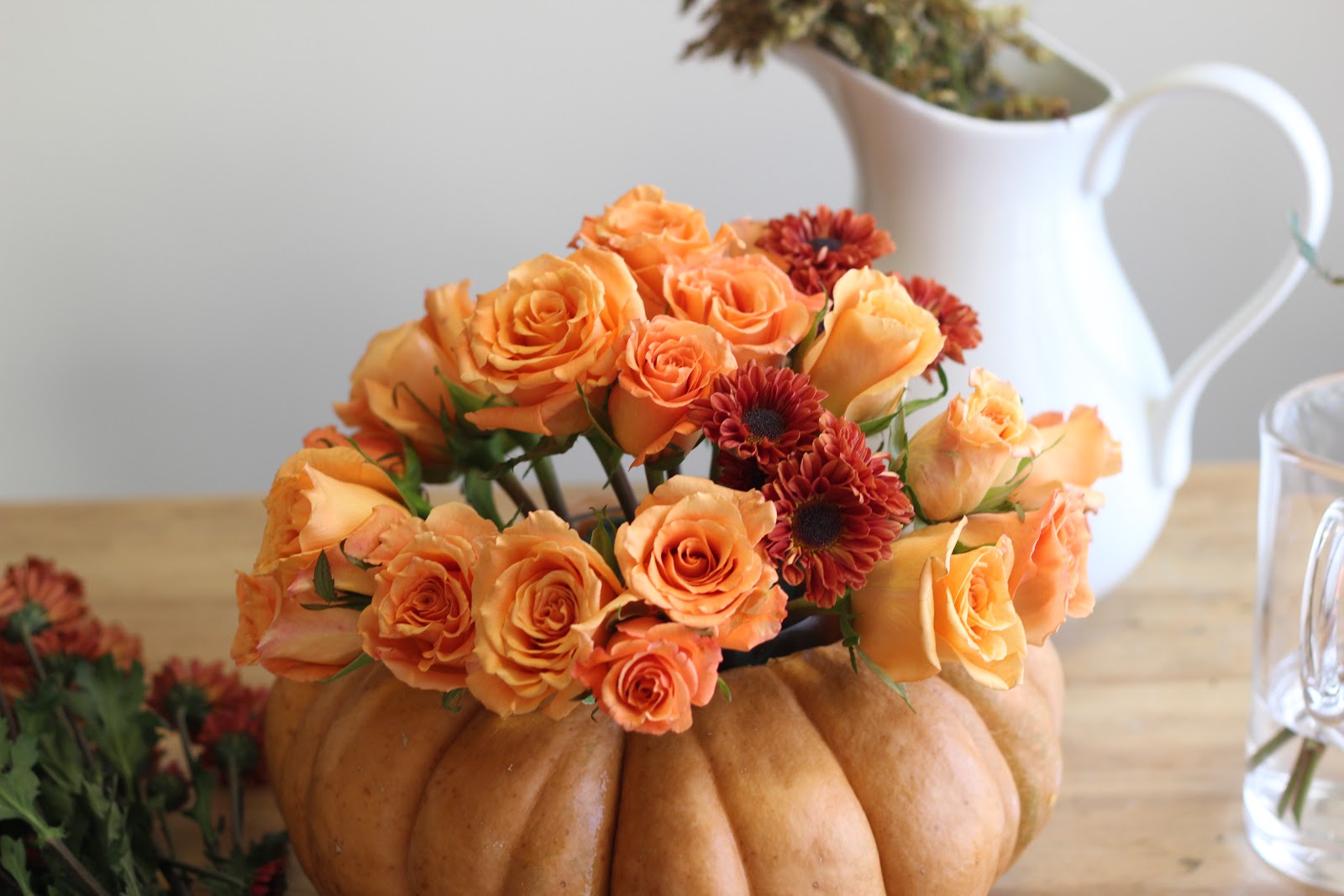 DIY Thanksgiving Centerpiece | Roses, Mums & Broom Cob in a Pumpkin ...