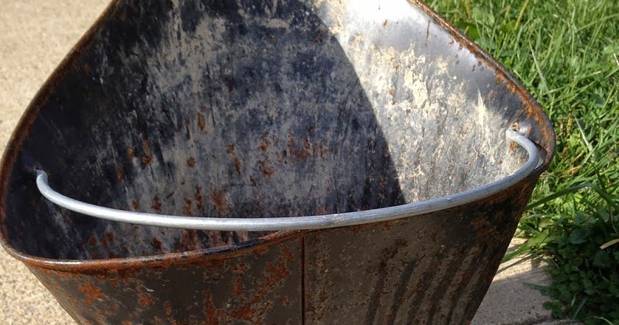 How to recycle a broken bucket into a planter - Feathers in the woods
