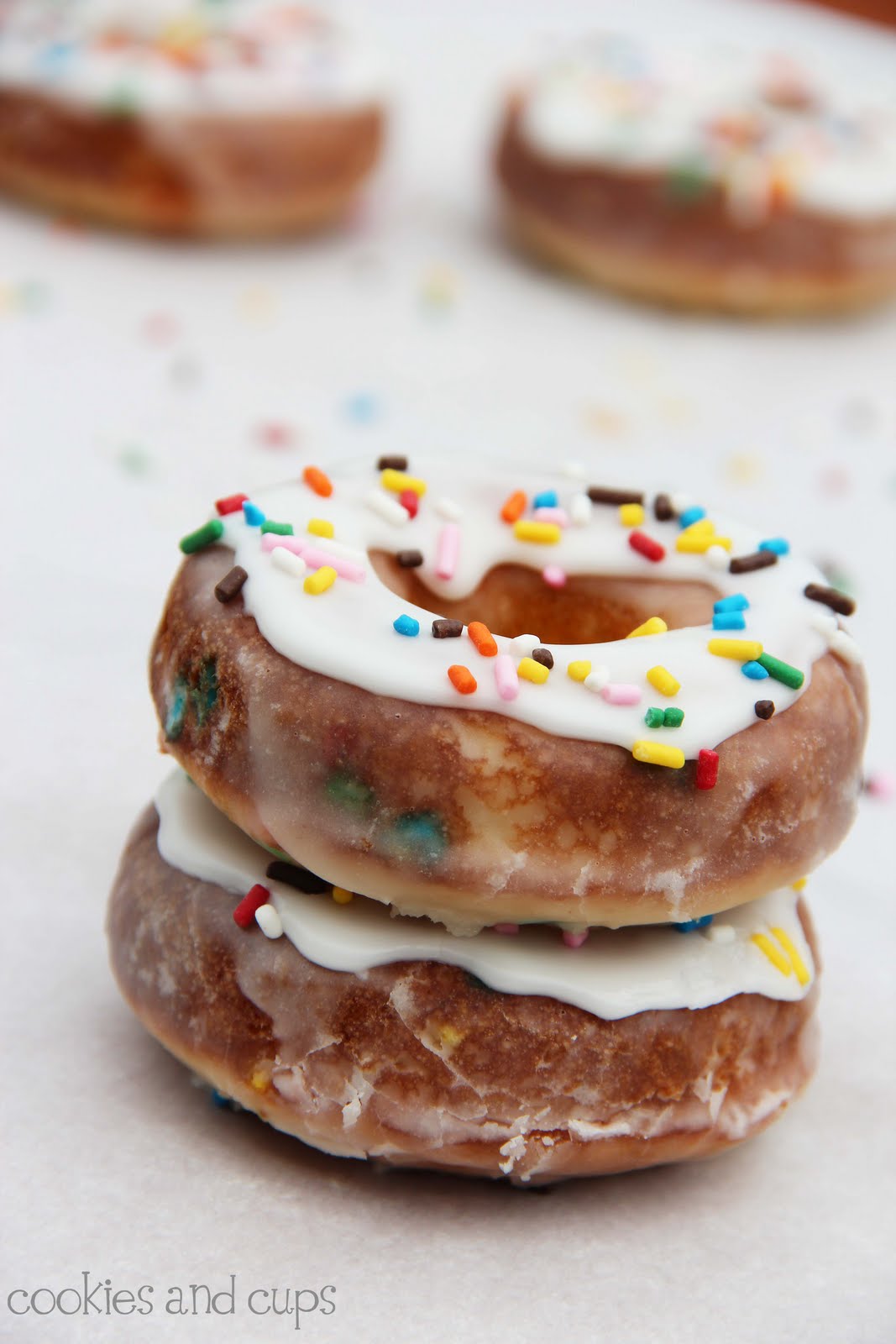 Double Glazed Funfetti Donuts - Cookies and Cups