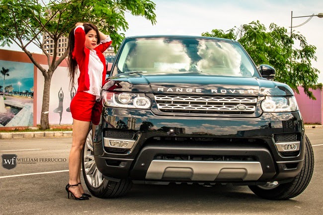 Rebellion office girl poses with Range Rover Sport | Carsfresh
