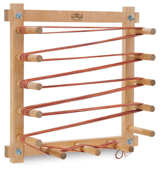 Durham Weaver: Making a warp and threading the 9 pattern slot heddle.