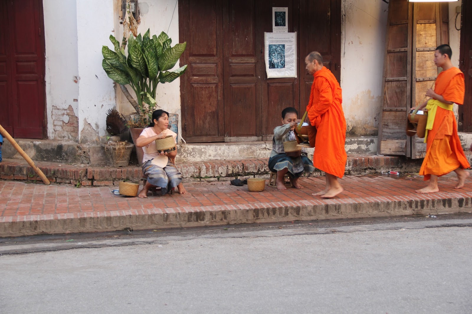 Indochina Holiday: Early morning with Monks, cooking school and Waterfalls