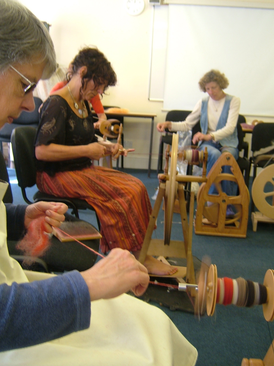 Long draw spinners at Summer School - Spinning School