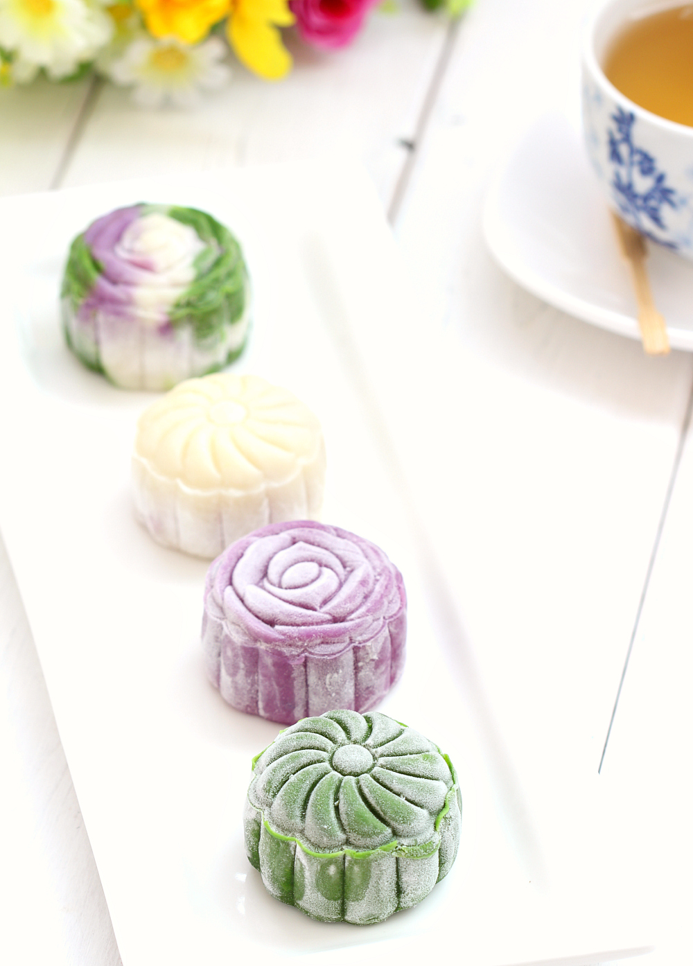 Snowskin mooncakes with purple sweet potato and cream cheese filling