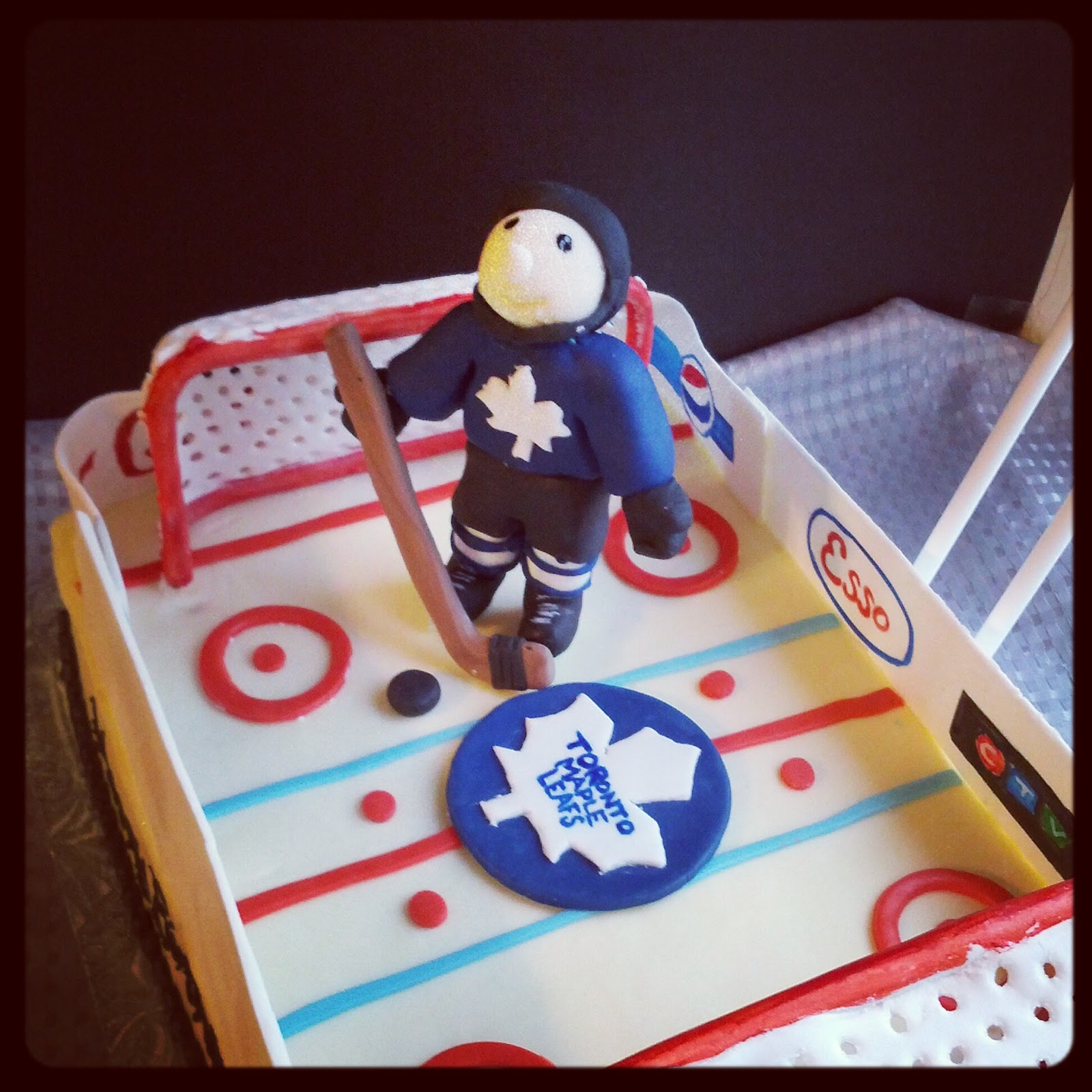 Second Generation Cake Design: Maple Leafs Hockey Rink Cake