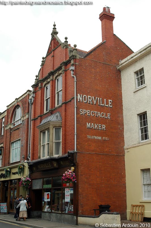 Painted signs and mosaics: Norville, Gloucester