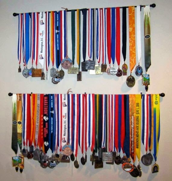 Made of Metal: Hang medals using a curtain rod