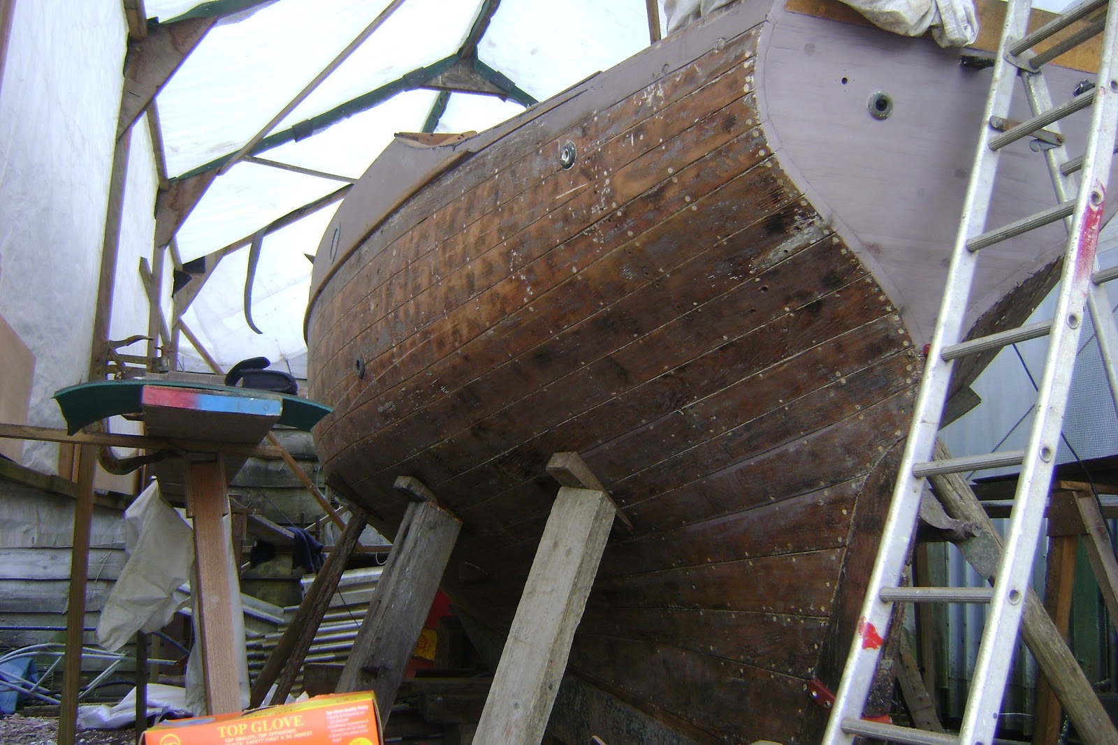 Marc'sBoats: Working on the hull: raking, hardening the caulking and re ...