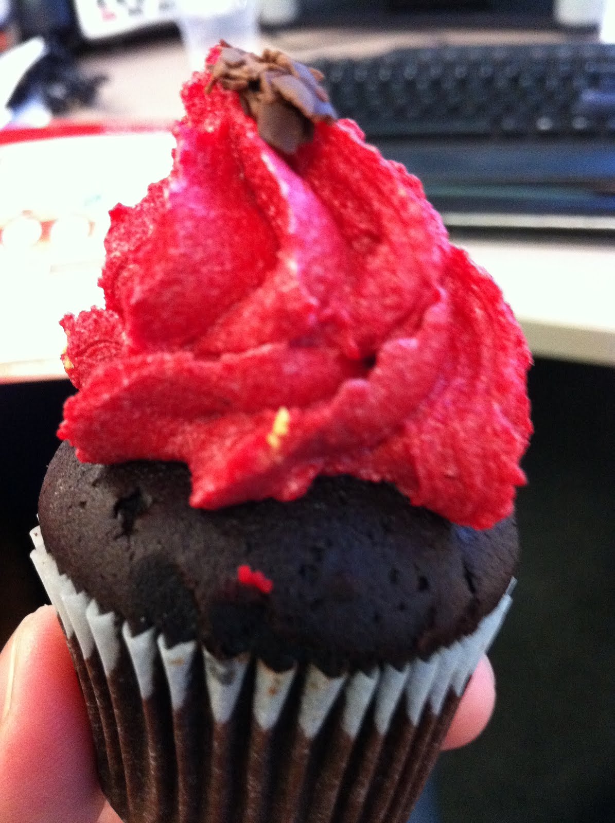 Here's a picture of...: ... a tasty chocolate cupcake with red icing