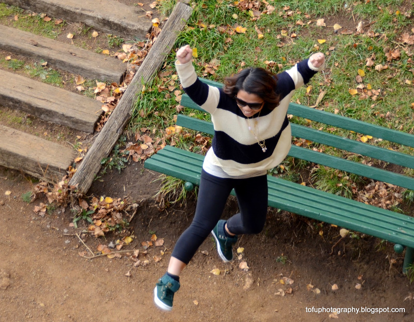 Tofu Photography: Woman jumping off a park bench in Richmond, Tasmania