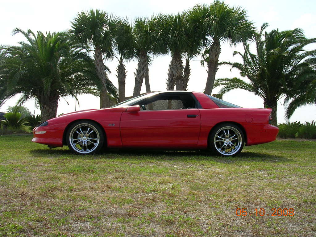 The World's Best 4th Gen Camaros: 97 Red Camaro SS LT1 on 20s