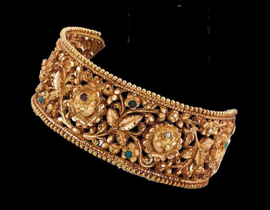 Broad golden bangles