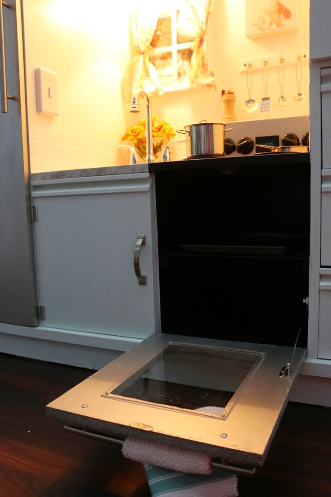 On A Cold Day: DIY Play Kitchen From Old TV Stand!