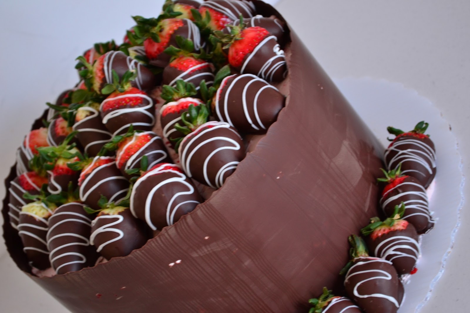 Oh, just put a cupcake in it....: Chocolate Covered Strawberry Cake...