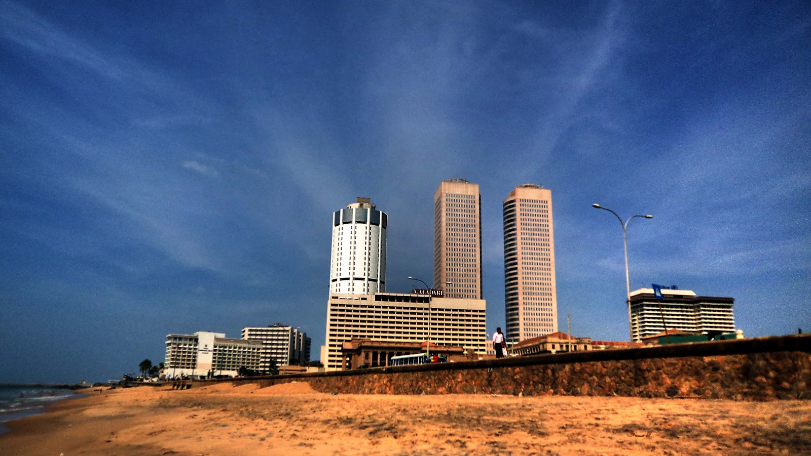 HDR Nature: Beach, Clouds and The City