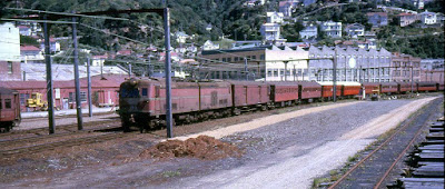 transpress nz: EW electric loco with a long suburban train passes ...