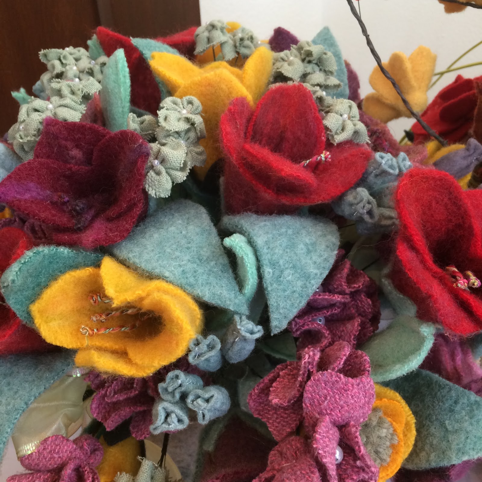 Women Matters Rug Art: WOOL FABRIC BOUQUETS