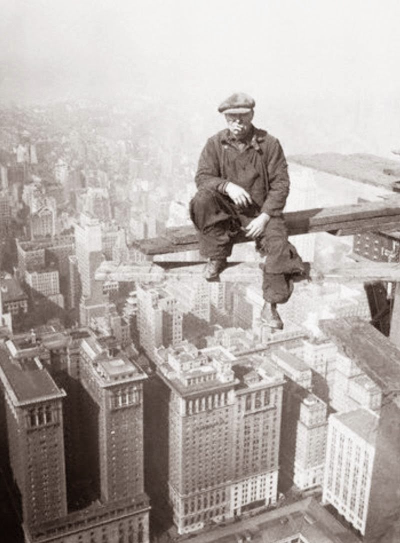 A worker relaxing during the construction of the Empire State Building ...