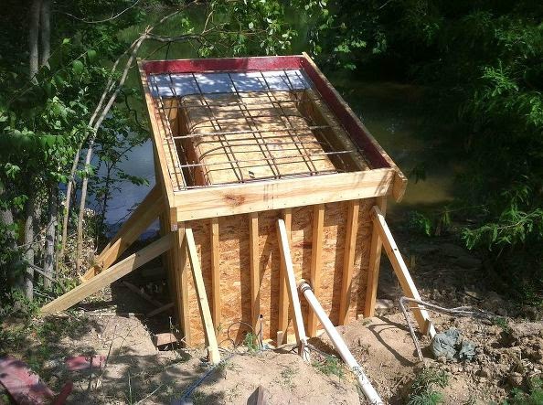 .: Vertical Carved Concrete Pump House