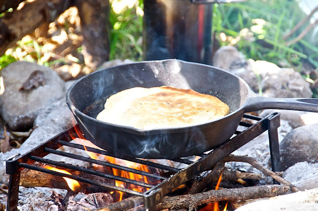 Backwoods Badger: A relaxing nap and some bannock made over the fire...