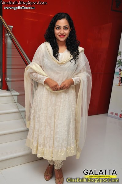 Nithya Menon Gorgeous in White Chudi Photo Gallery At Audio Launch of ...