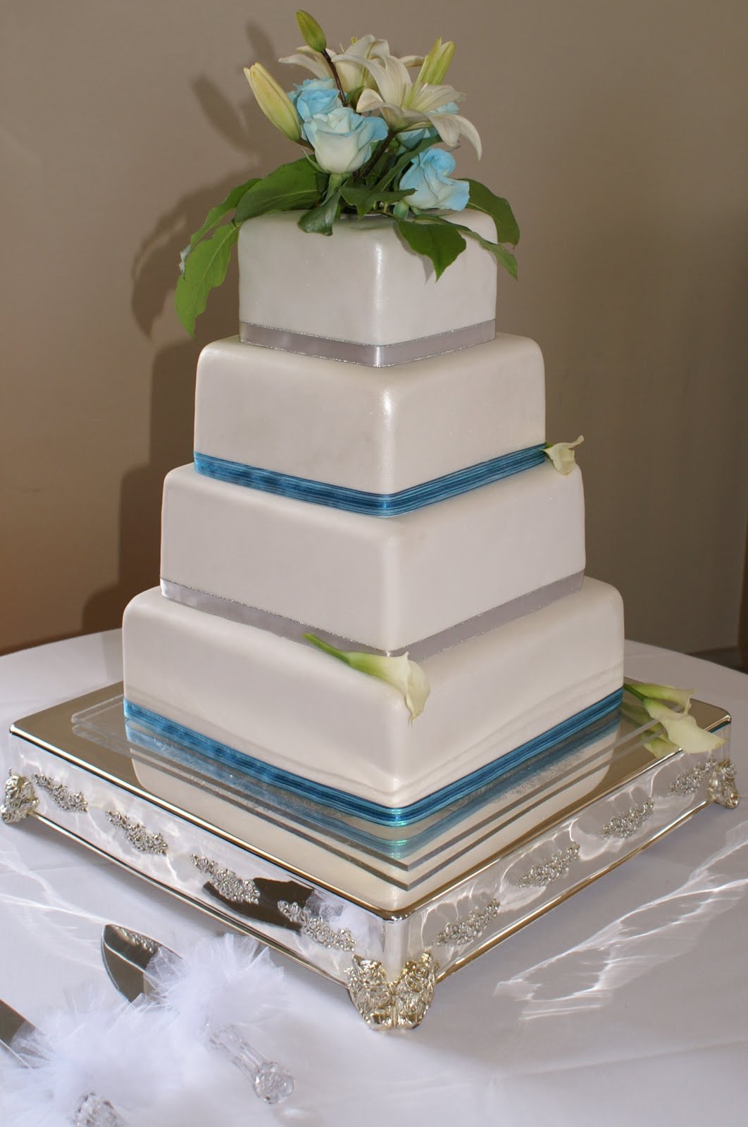 Pace Of Cakes: Four Tier Square Covered in Pearl Dust