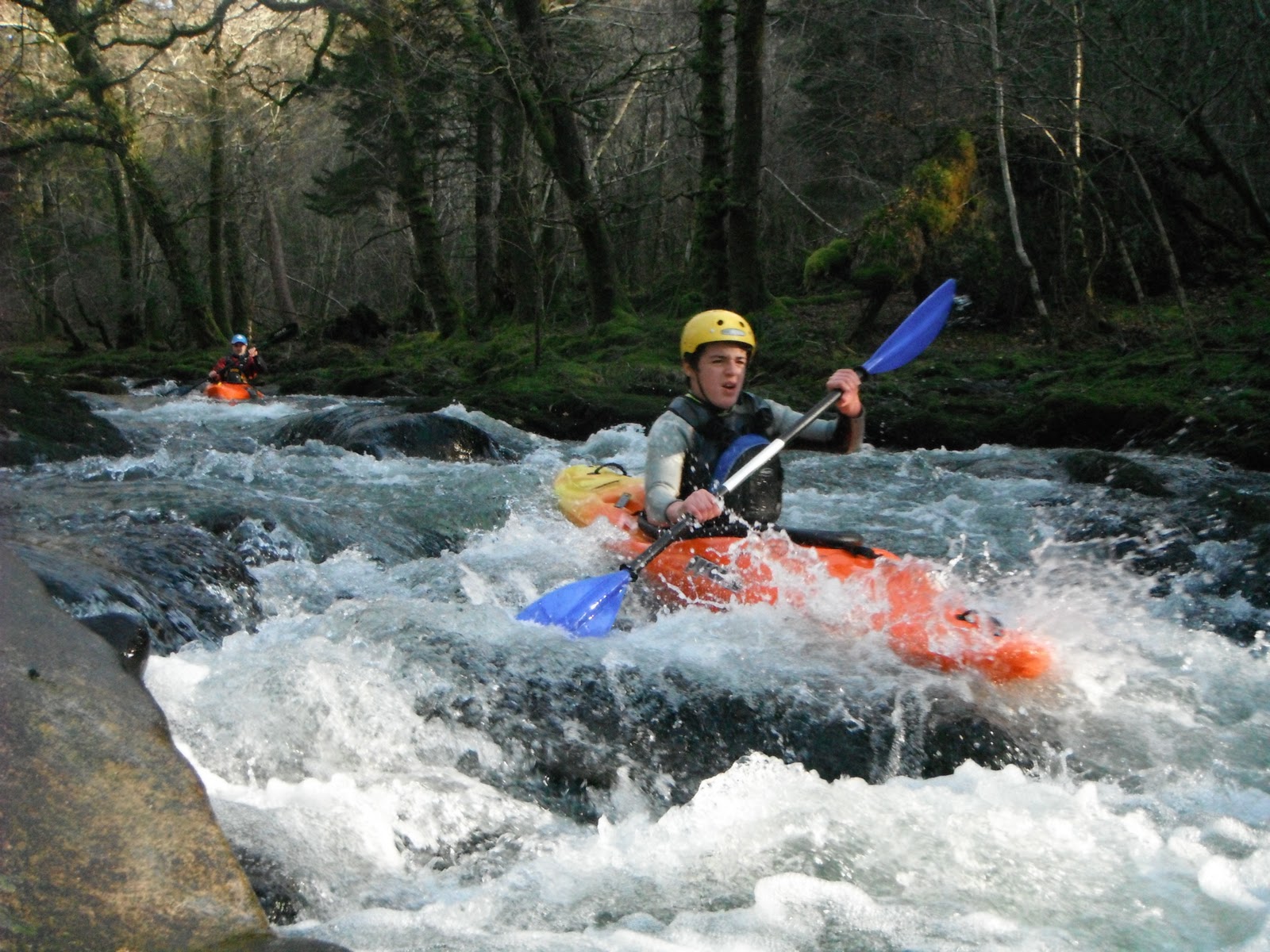 Plymouth College Outdoor Education: Student Kayaking on the River Walkham