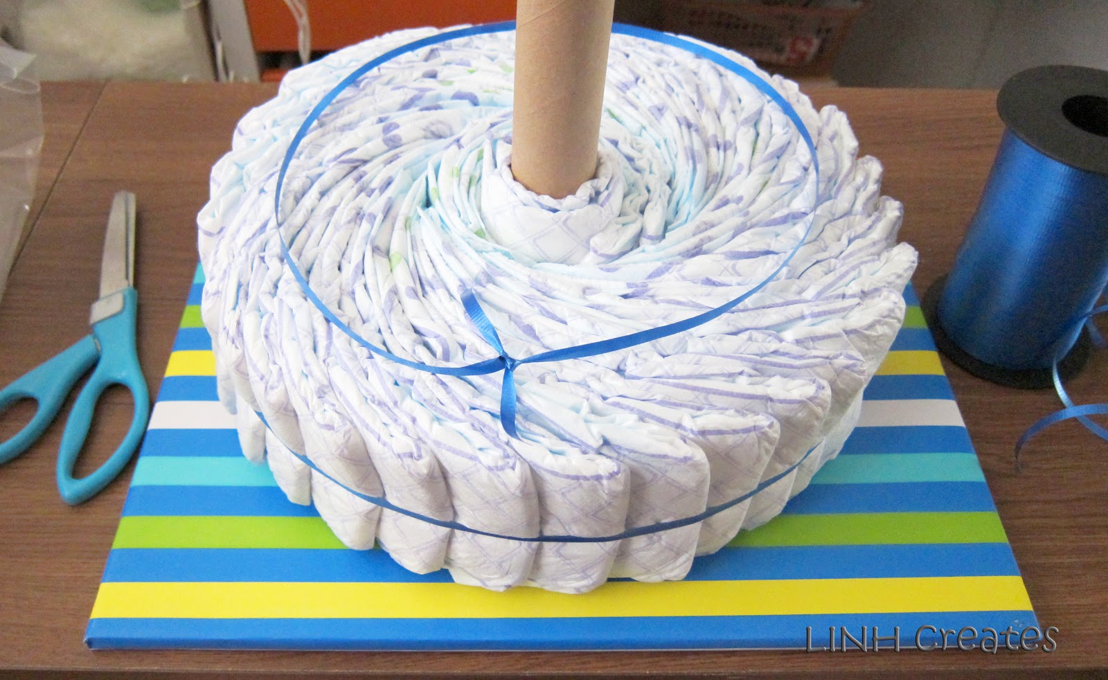 linh creates . . . paper crafts consume me: Tutorial: Diaper Cake