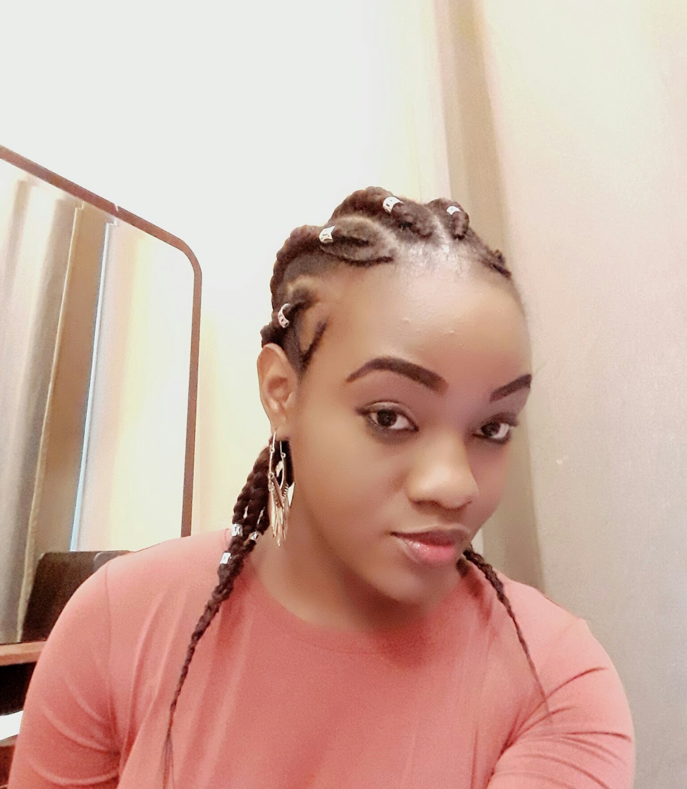 Feed - in cornrow braids