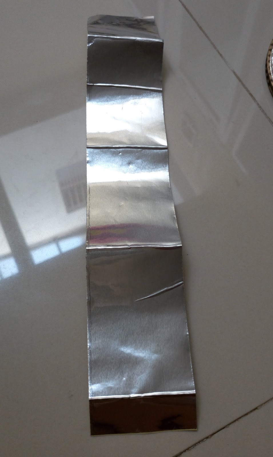 Perbaiki Burner kompor yang meletup-letup sementara dengan Lem Panci ...