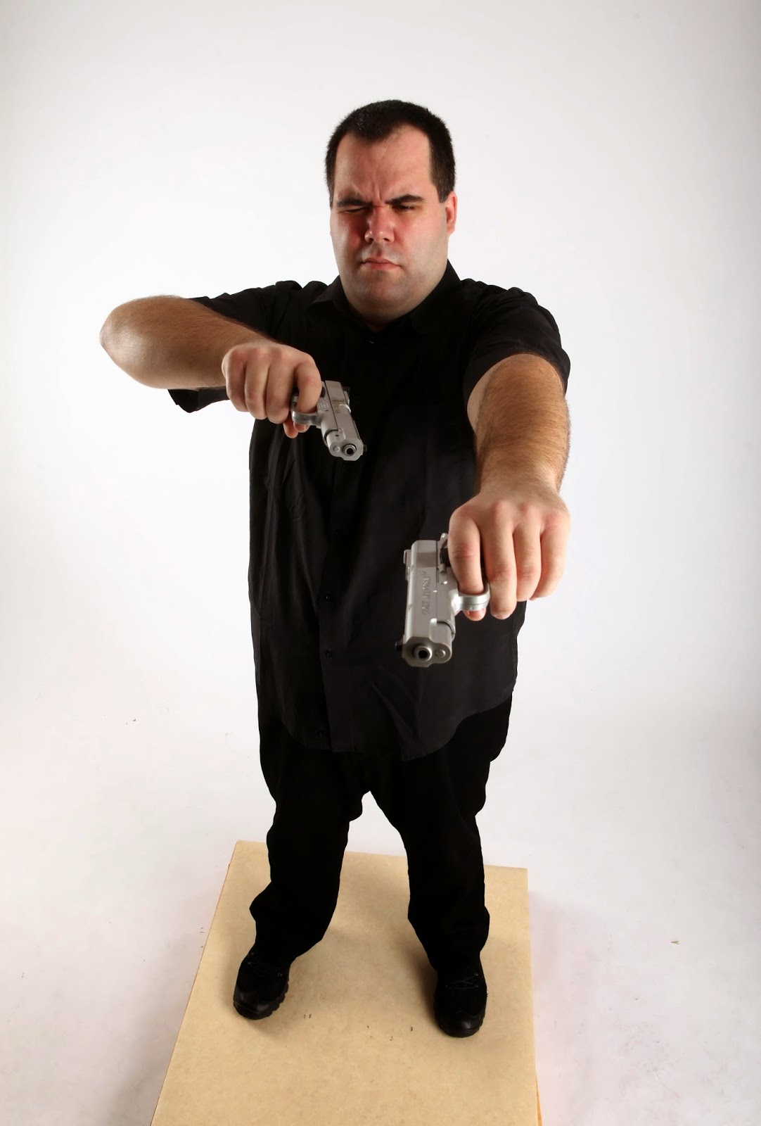 3D human referenses: Mobster Dual Guns Pose
