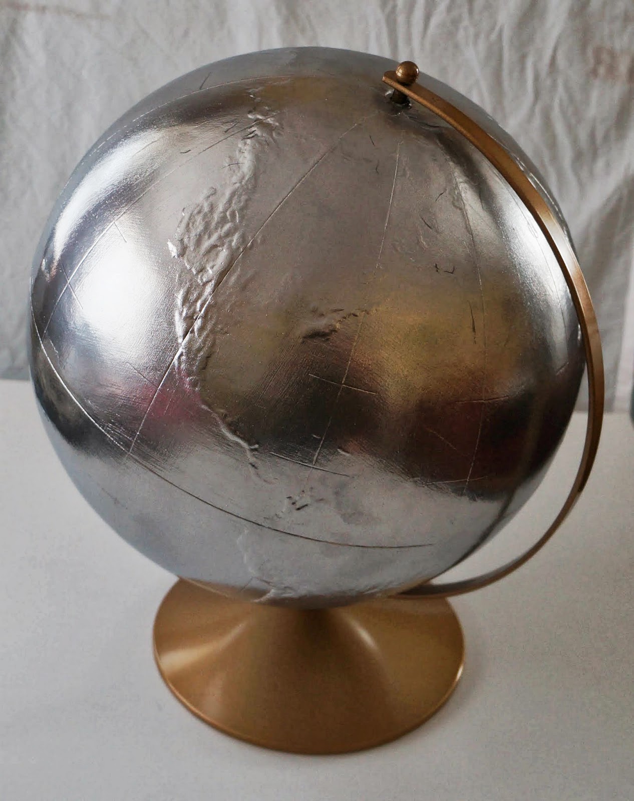 Ginger Wilson: Silver globe