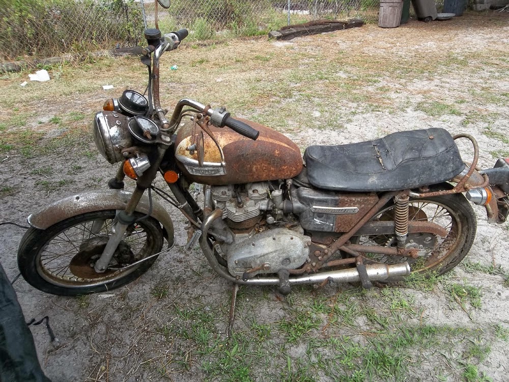 Oil stain garage: Rusty Triumph barn find